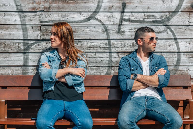 Angry couple sitting stock image. Image of contemplate - 256048813