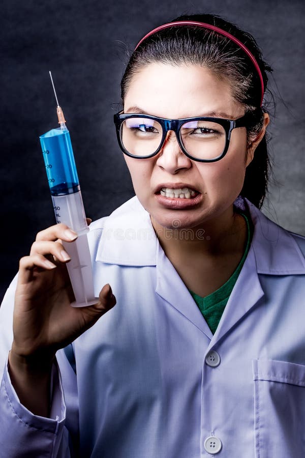 Angry Crazy Asian Doctor with a Syringe Stock Image - Image of female ...