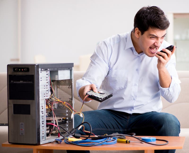 Angry Customer Trying To Repair Computer with Phone Support Stock Image ...