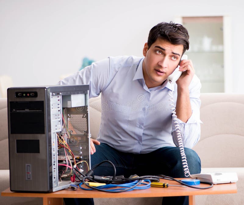 Angry Customer Trying To Repair Computer with Phone Support Stock Image ...