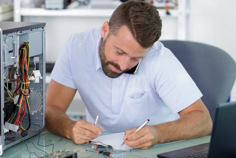Angry Customer Trying To Repair Computer with Phone Support Stock Photo ...