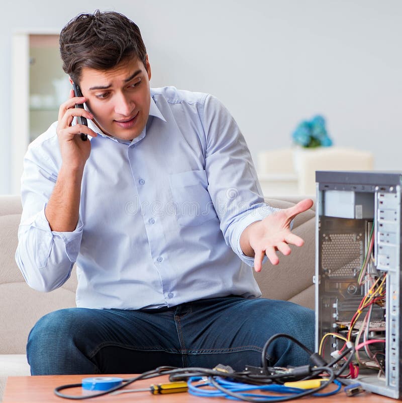 Angry Customer Trying To Repair Computer with Phone Support Stock Photo ...
