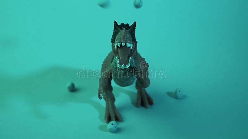 Angry Dinosaur Looking and Easter Eggs Falling Stock Footage - Video of ...