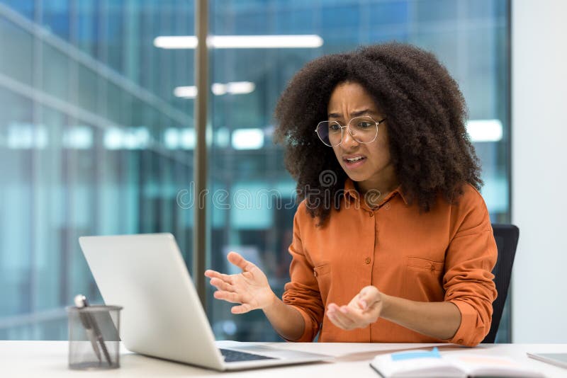 Angry and Dissatisfied Businesswoman Looking at Laptop Screen. Employee ...