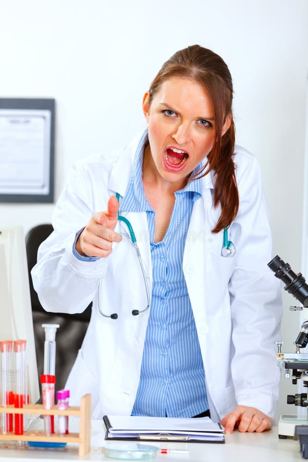 Angry Doctor Woman Shouting and Pointing on You Stock Photo - Image of ...