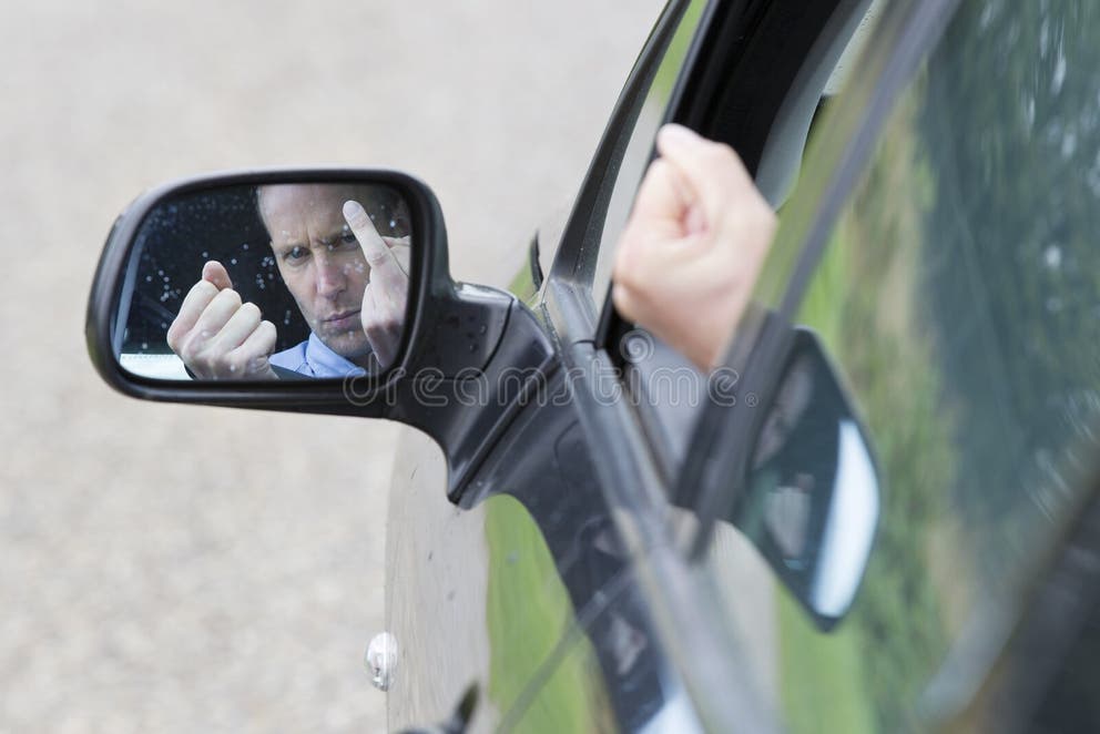 Angry driver giving finger stock photo. Image of cross - 27052712