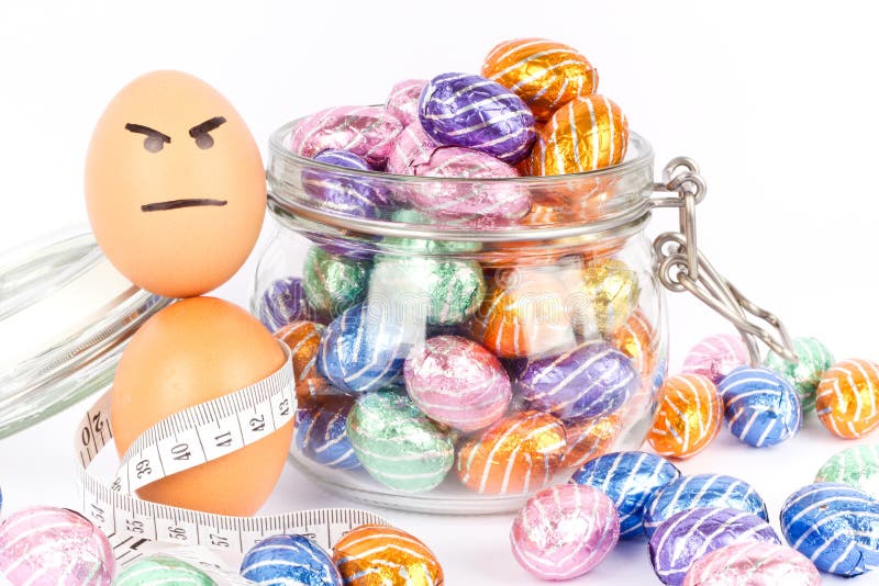 Angry Egg between Chocolate Easter Eggs Stock Image - Image of isolated ...