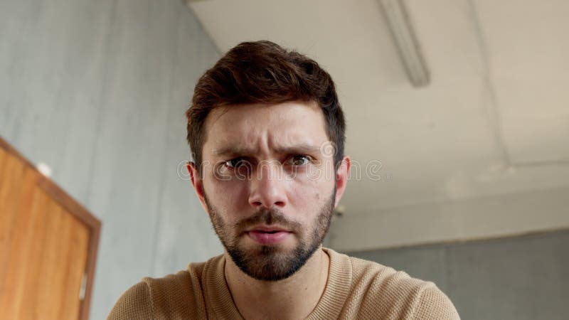 Angry Emotional Man Looking at the Camera Stock Image - Image of device ...