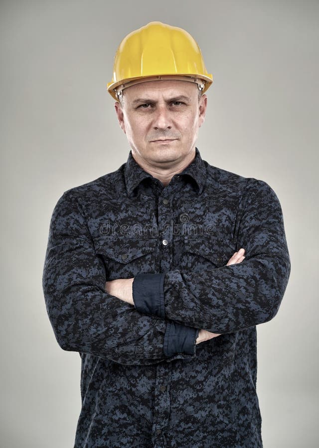 Angry Engineer with Arms Folded Stock Photo - Image of engineer, adult ...