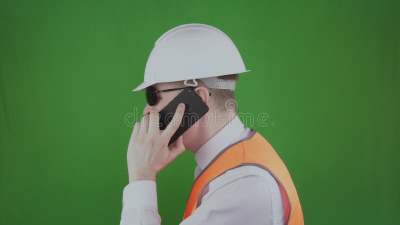 Angry Engineer or Builder Nervously Talking on Phone about Construction ...