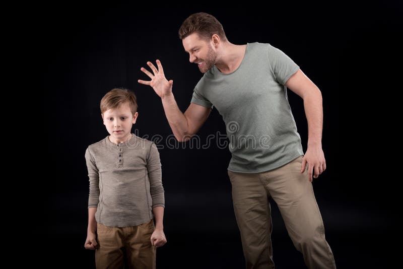 Angry Father Threatening and Gesturing To Scared Little Son, Stock ...