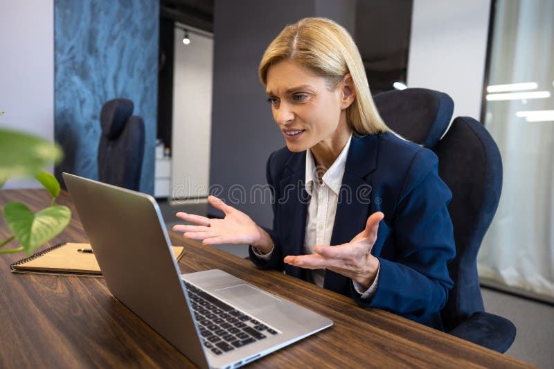 Angry Female Company Executive Wearing Suit Working on Computer at ...