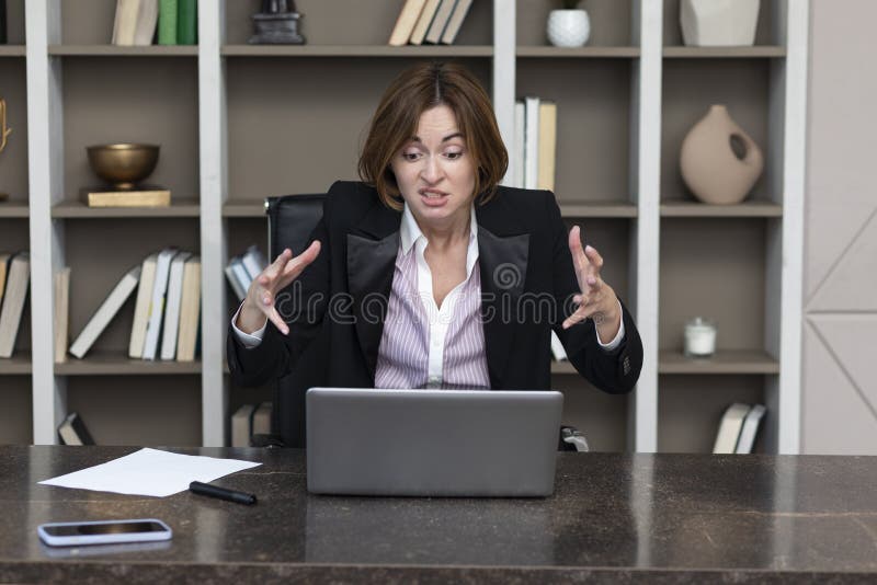 Angry Female Office Worker Demonstrating Her Irritation and ...