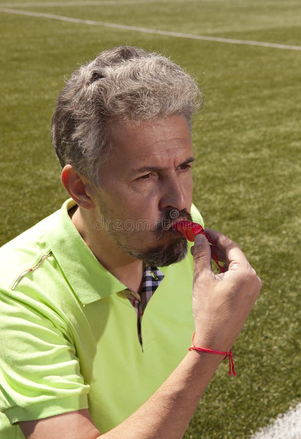 Angry Football Referee Blowing a Whistle Stock Photo - Image of point ...