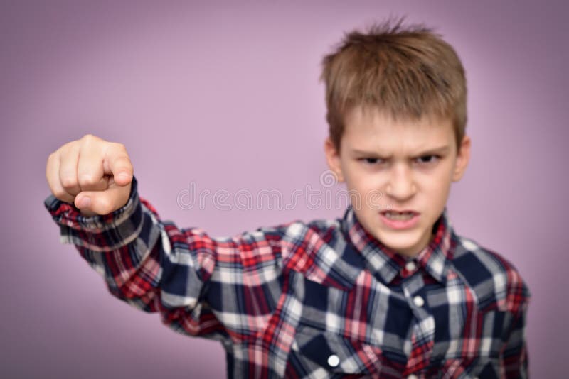 Angry and Furious Young Boy Stock Image - Image of finger, fury: 129799277