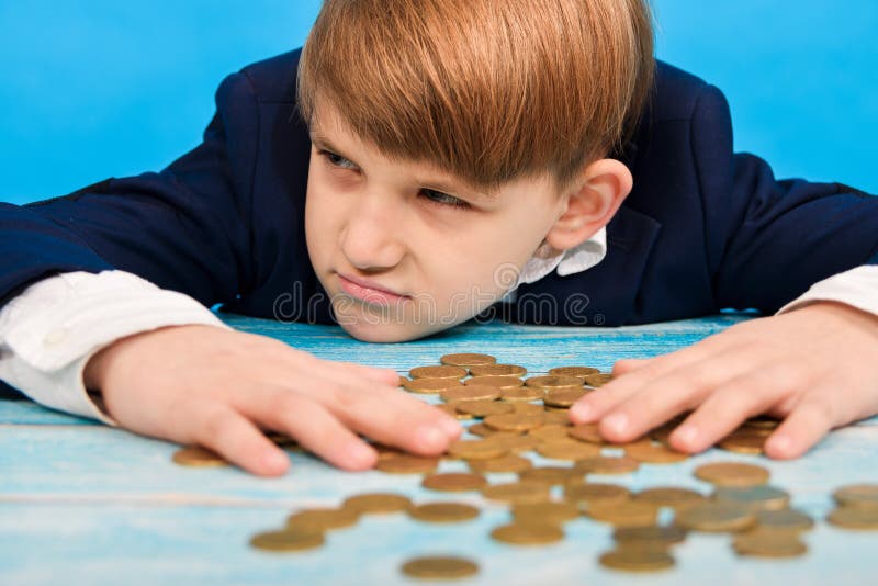 An Angry and Greedy Child Hides Money so that No One Can Take it Stock Photo - Image of ...