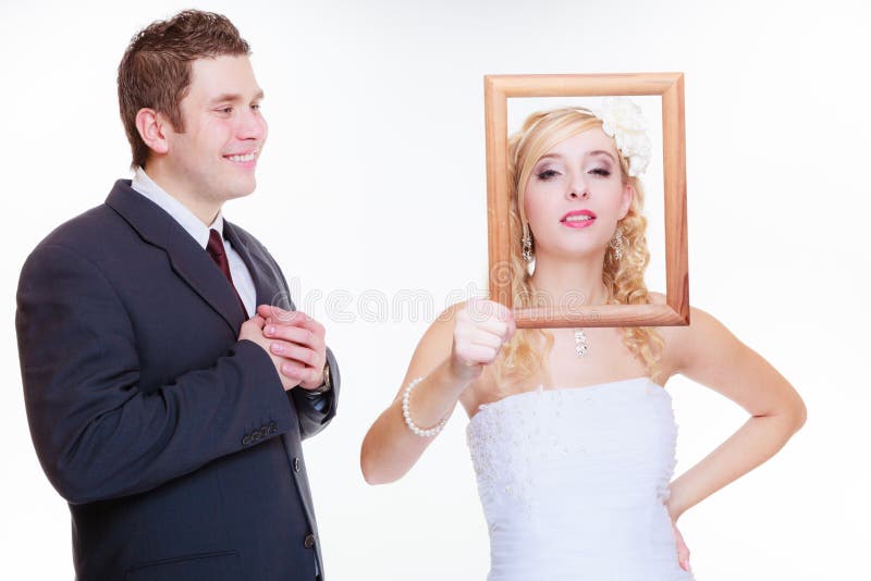 Angry Groom and Bride Holding Empty Frame Stock Image - Image of ...