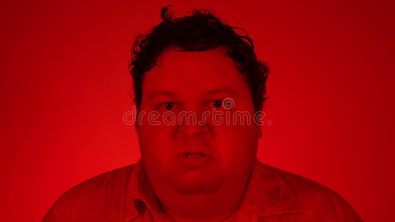 Angry Grumpy Young Man Frightened - Feeling Angry - Red Lighting Stock ...
