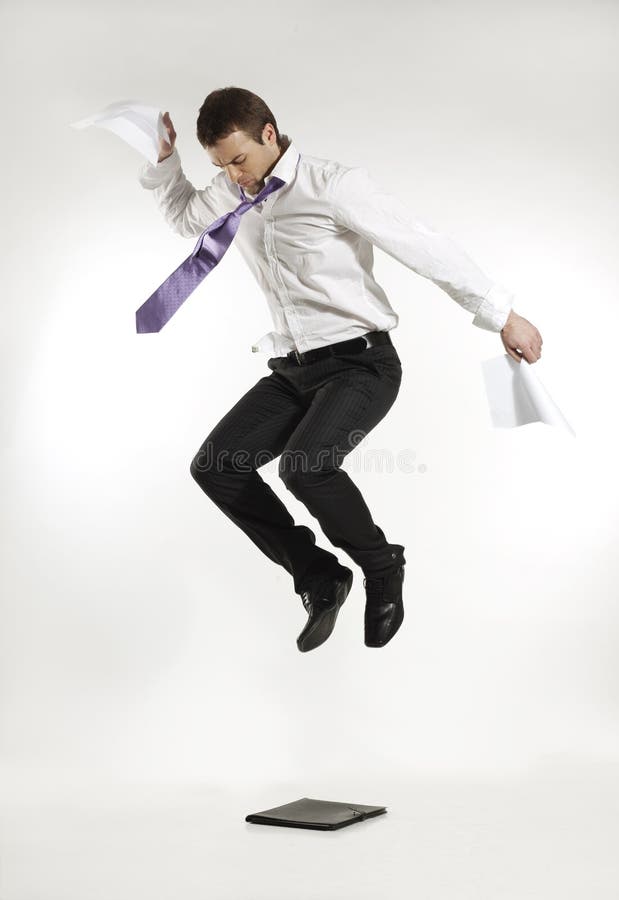 Angry jumping businessman stock photo. Image of annoyance - 19609838