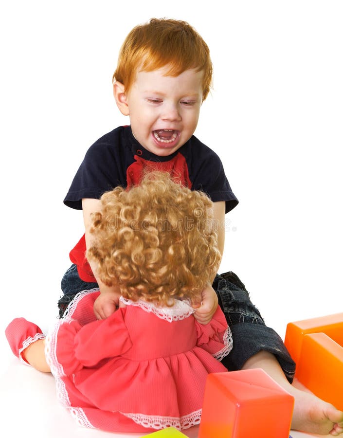 Angry kid with a doll stock photo. Image of emotional - 6855266