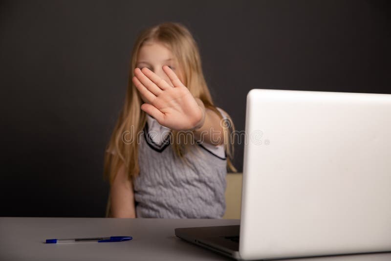 Angry Kid Showing Stop Sign Isolated Infront of the Computer. Stock ...
