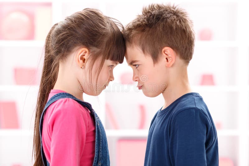 Angry Kids Looking at Each Other Stock Image - Image of angry, little ...