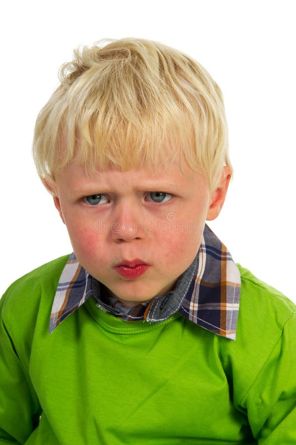 Angry little boy stock image. Image of green, shirt, caucasian - 25626095