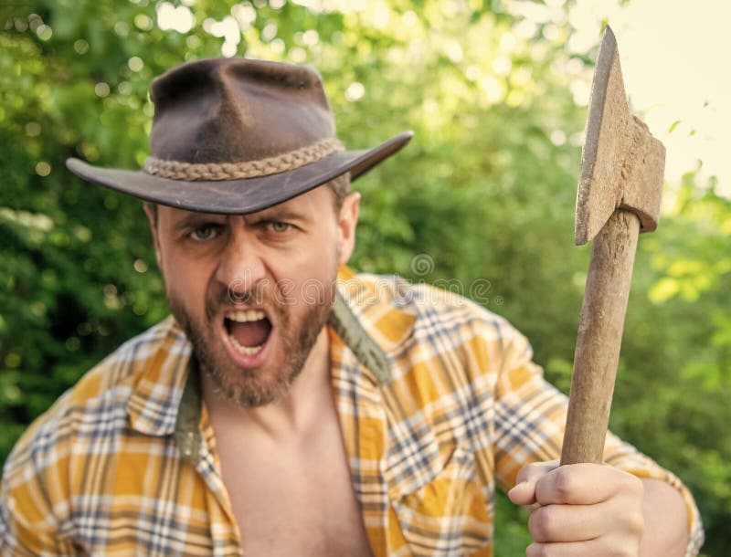 Angry Lumberjack with Axe in Selective Focus. Angry Lumberjack with Axe ...