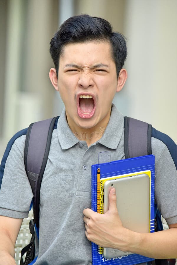 Angry Male Student with Books Stock Image - Image of male, books: 146702343