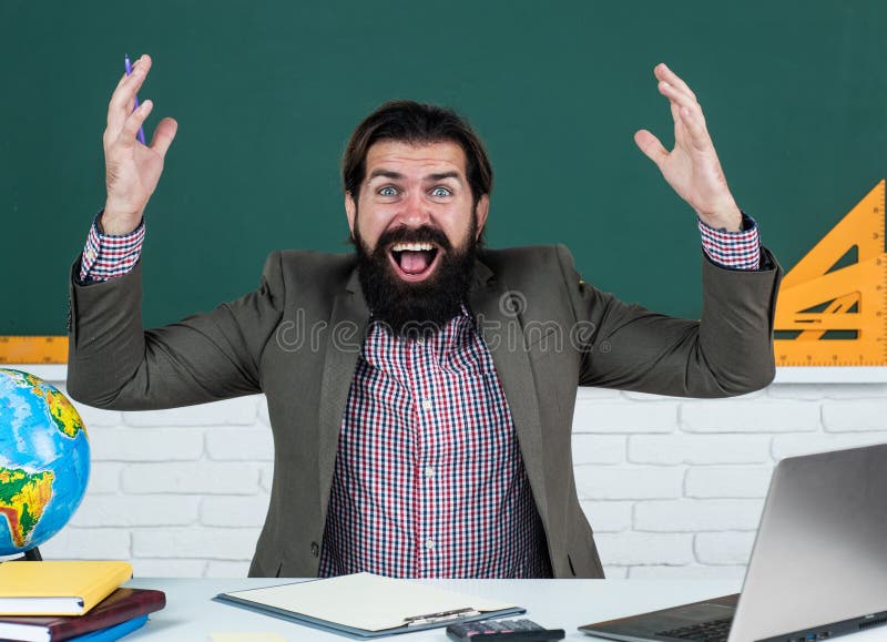 Angry Male Teacher with Laptop in Classroom, Education Stock Photo ...