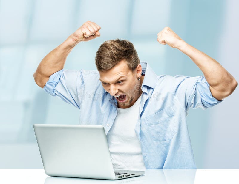 Angry man behind laptop stock photo. Image of shirt, chat - 39584362