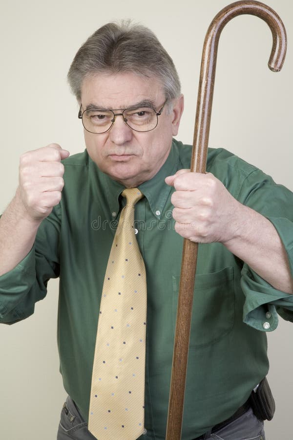 Angry Man with Cane stock image. Image of dressed, cane - 4436075