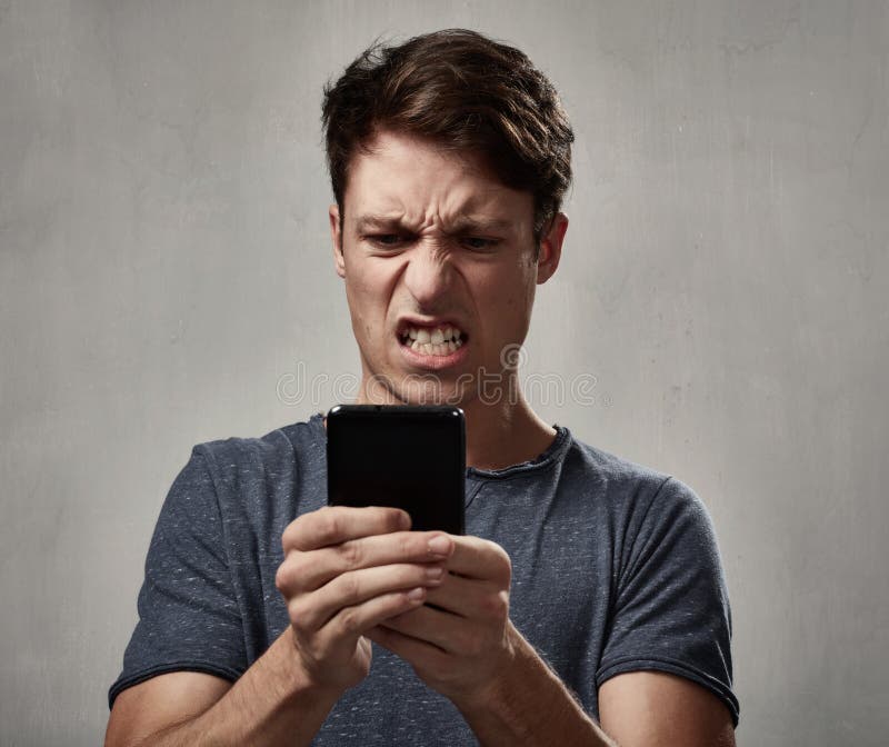 Angry man with cell phone. stock photo. Image of frustration - 81713566