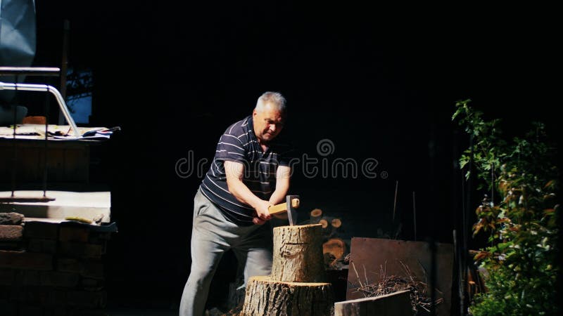 Angry Man Chopping Wood at Night. Agriculture. Horror, Night Work ...