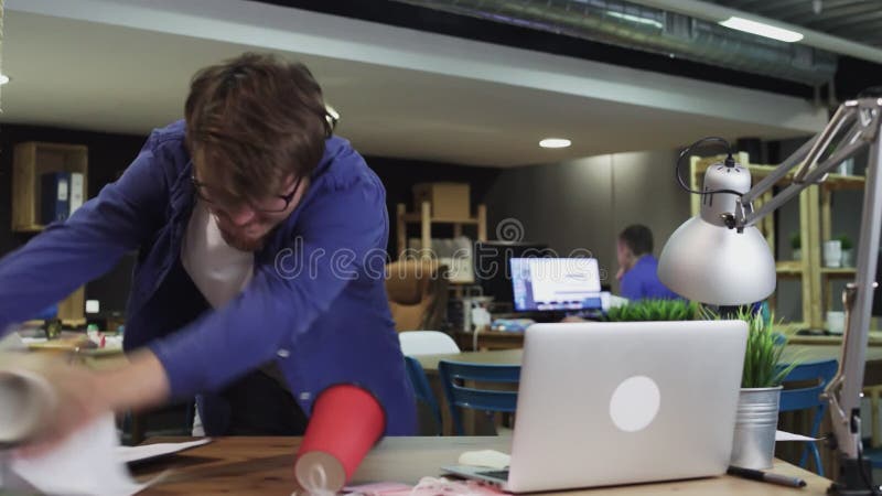 Angry Man Comes Up and Drops Everything Off the Table Stock Video ...