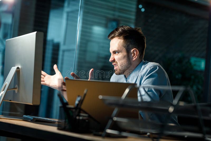 Angry Man with Computer in Office Stock Image - Image of malfunction ...