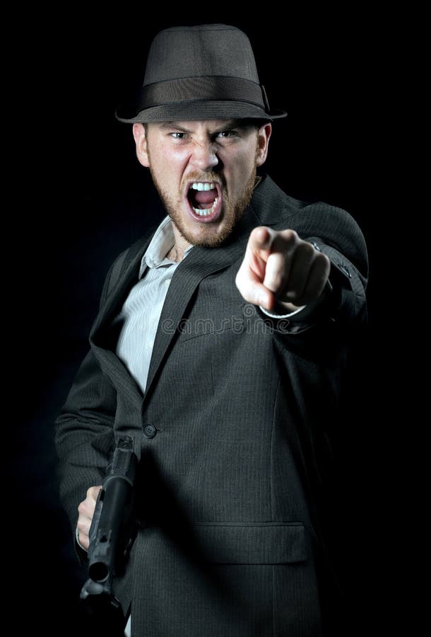 Angry Man with Gun stock image. Image of expressive, suit - 28439139