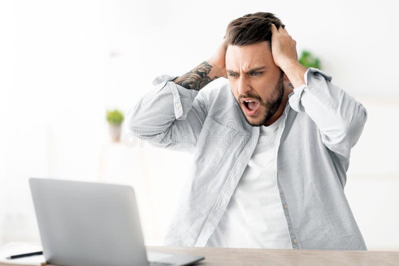 Angry Man Having Software, Website Error, Looking at Laptop Screen and ...
