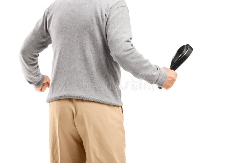 Angry Man Holding a Belt, Ready To Beat Someone Stock Photo - Image of ...