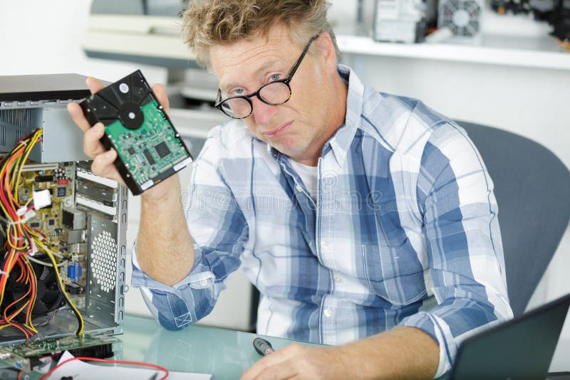 Angry Man Holding Broken Component Stock Photo - Image of adult, office ...