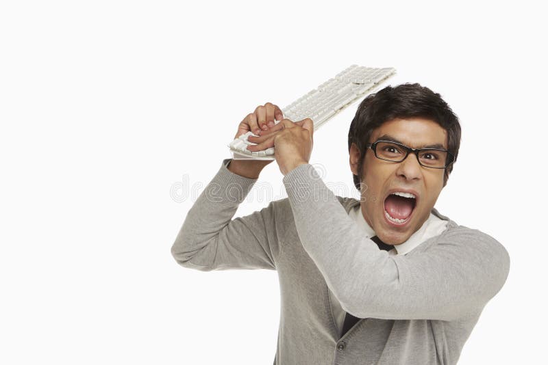 Angry Man Holding Up a Computer Keyboard Stock Image - Image of camera ...