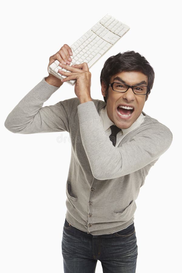 Angry Man Holding Up a Computer Keyboard Stock Image - Image of anger ...