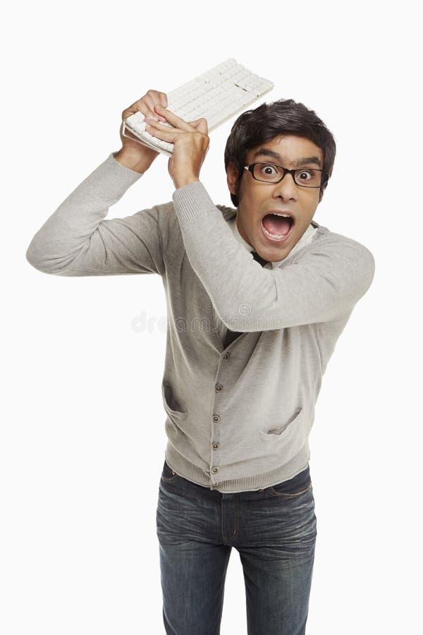 Angry Man Holding Up A Computer Keyboard Stock Image - Image of camera ...