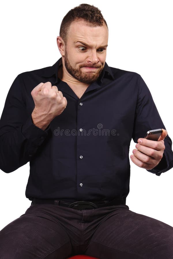 Angry Man Looking at His Mobile Phone Stock Photo - Image of casual ...