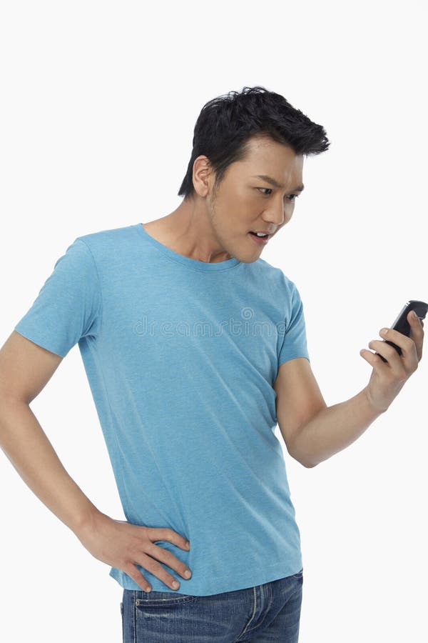 Angry Man Reading a Text Message Stock Photo - Image of casual ...