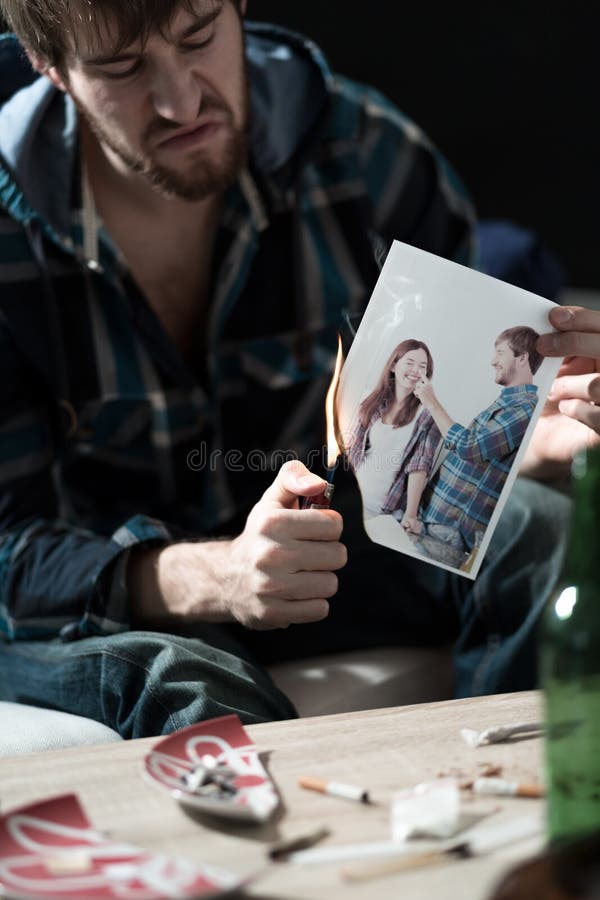 Angry Man Sets Photo on Fire Stock Photo - Image of gloomy, broken ...