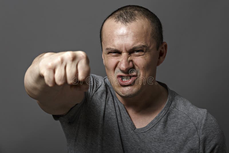 Angry man shows his fist stock image. Image of attack - 64914849
