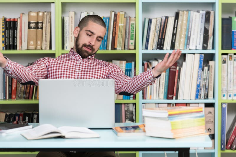 Angry Man Sitting at the Library Stock Image - Image of education ...