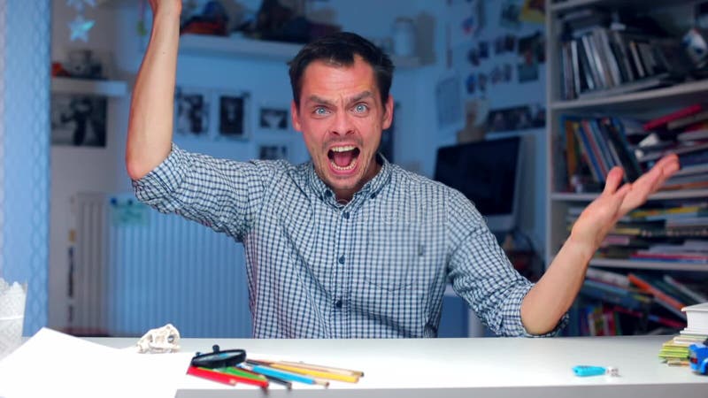 Angry Man Sitting at a Table in the Office Throws Paper Documents Stock ...