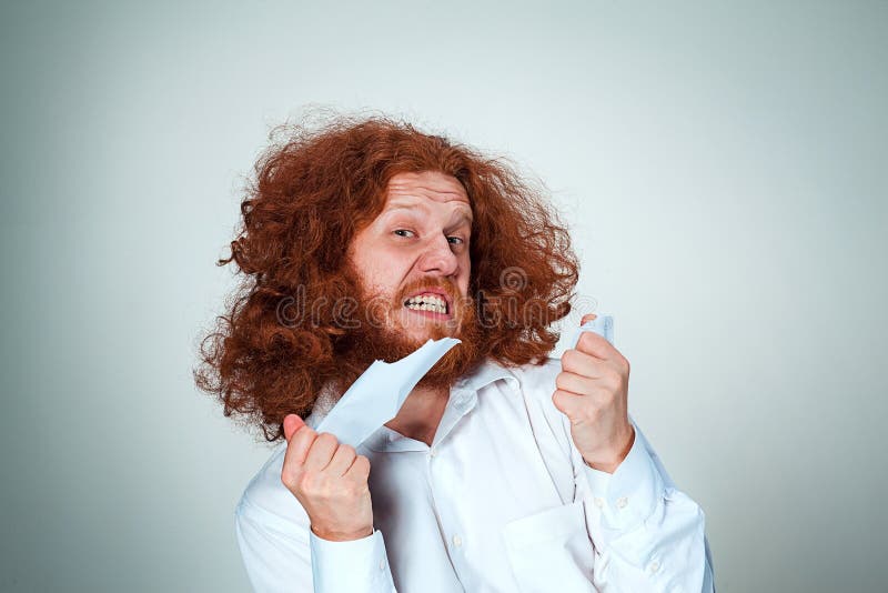Angry man tear out paper stock image. Image of elegance - 73676431